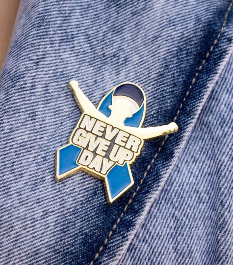 Choose a pin that symbolizes the fight you will never give up on.